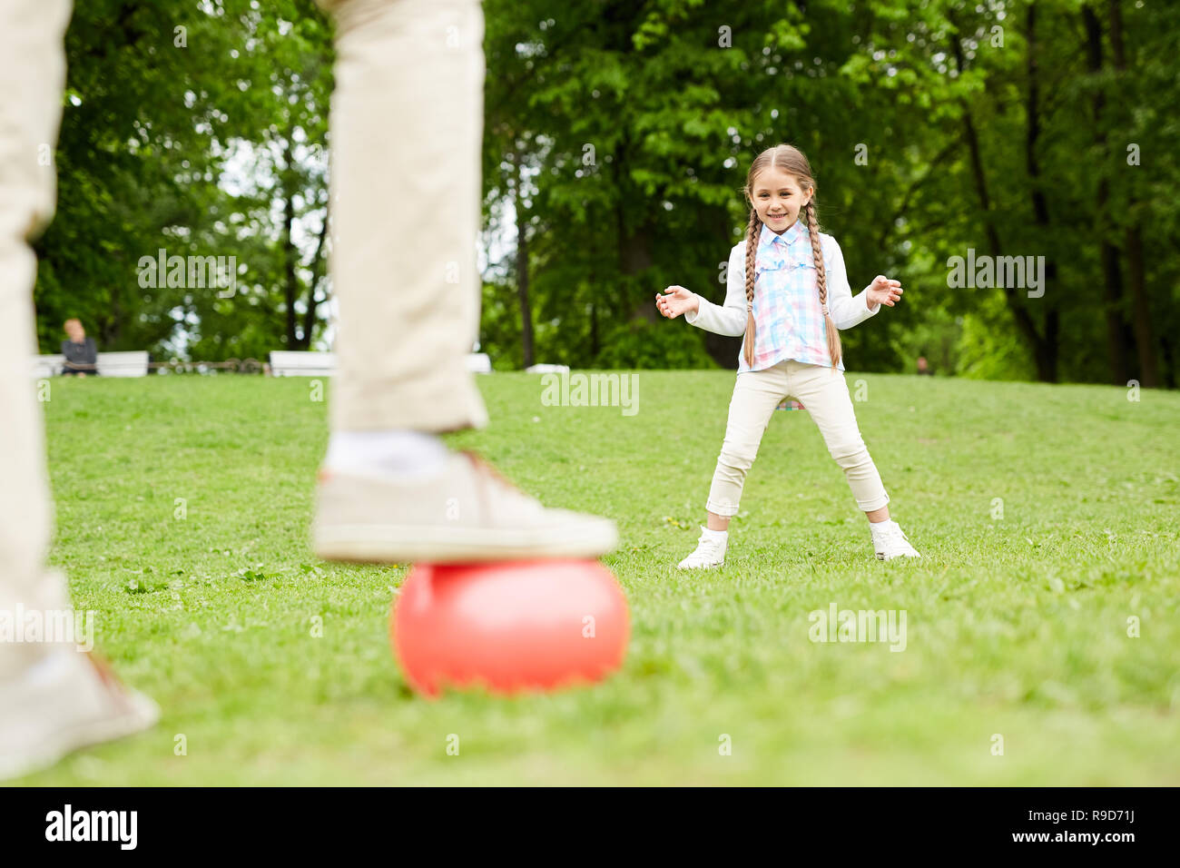 Child catching ball hi-res stock photography and images - Alamy