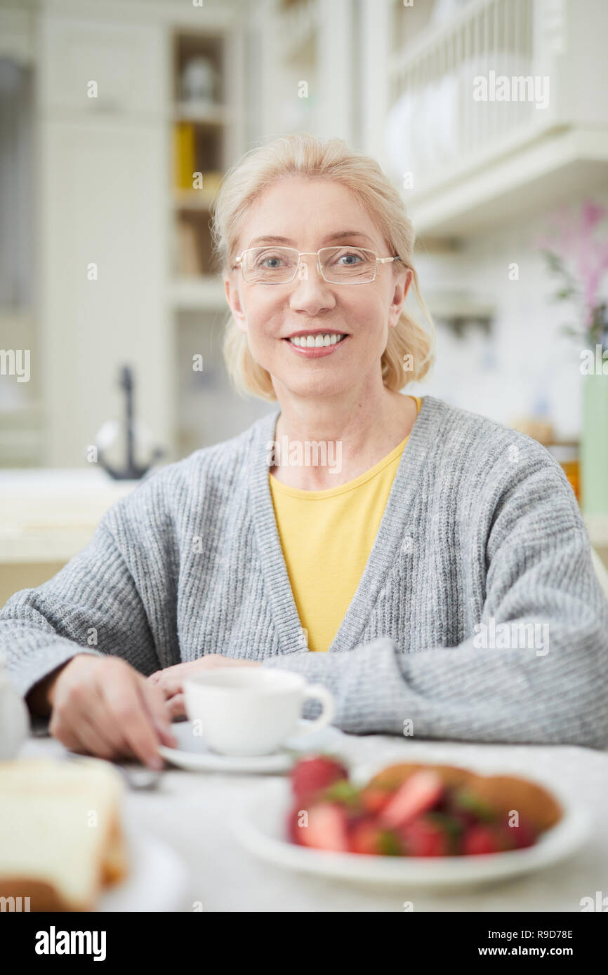 Woman having drink Stock Photo - Alamy