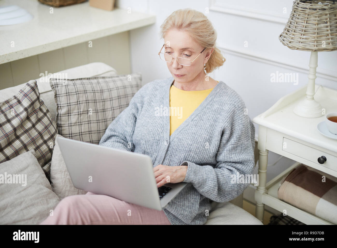 Mature woman typing hi-res stock photography and images - Alamy