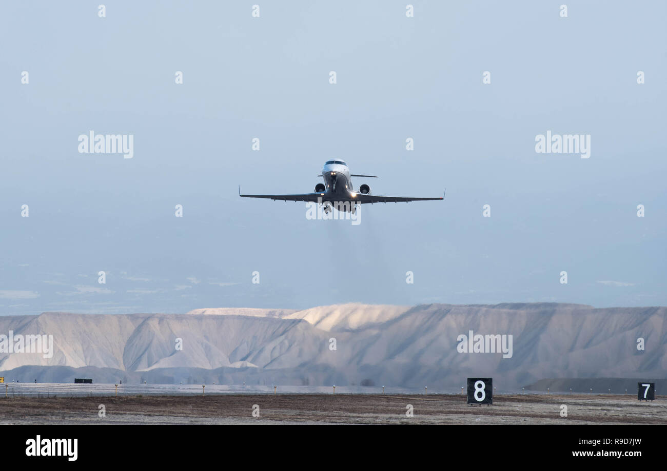 Commercial Passenger Jet Aircraft taking off and landing at an airport ...