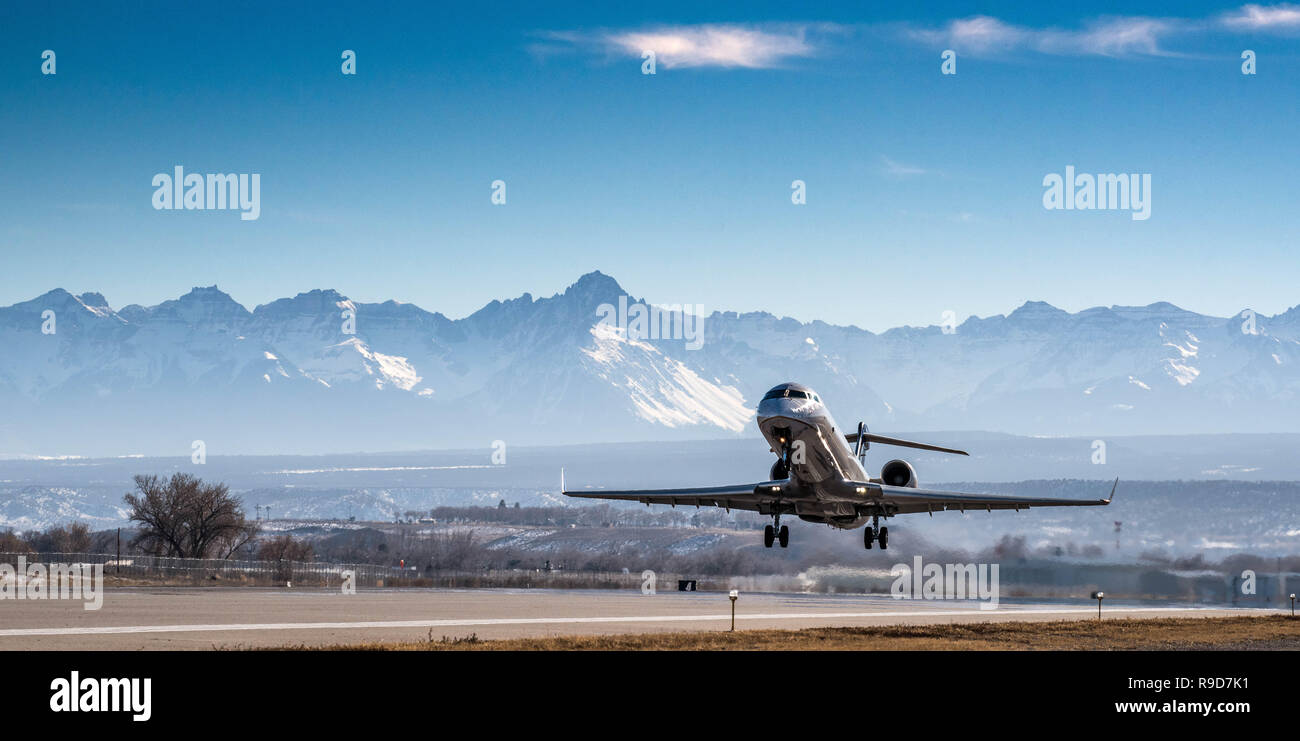 Commercial Passenger Jet Aircraft taking off and landing at an airport ...