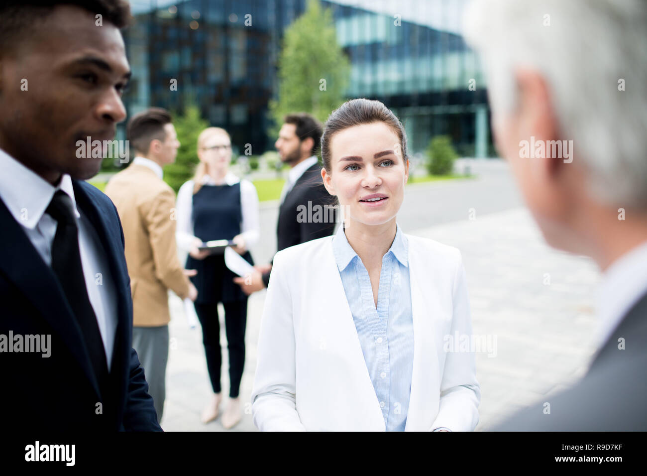 Delegates talking hi-res stock photography and images - Alamy