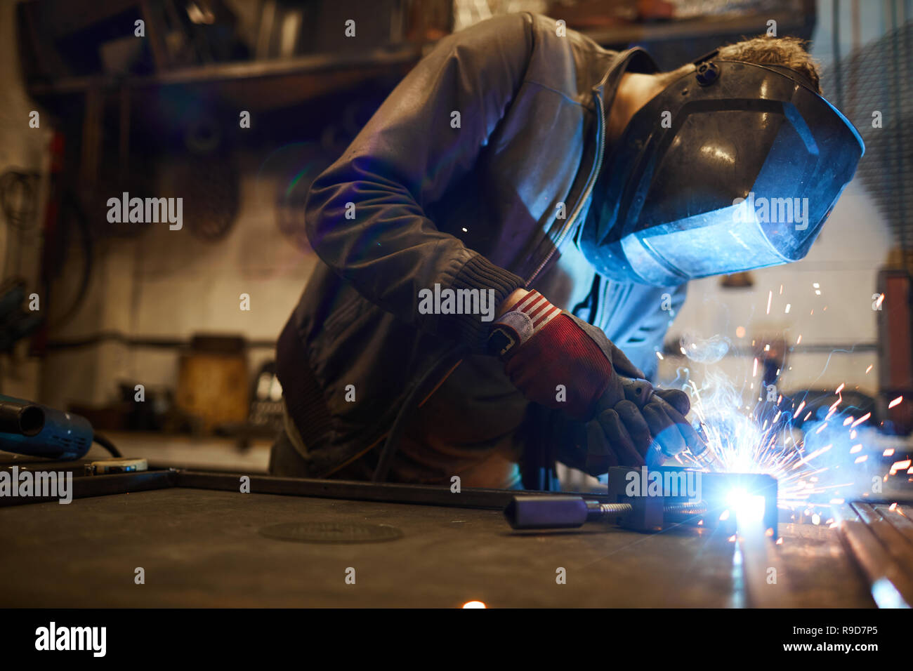 Welding iron workpieces Stock Photo - Alamy