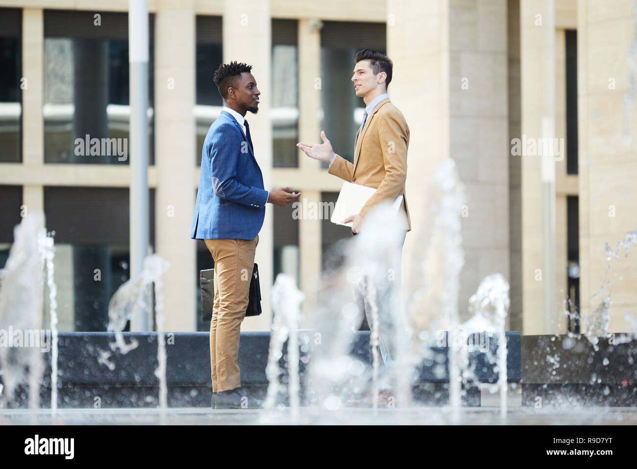 Discussing Working Ideas Stock Photo Alamy