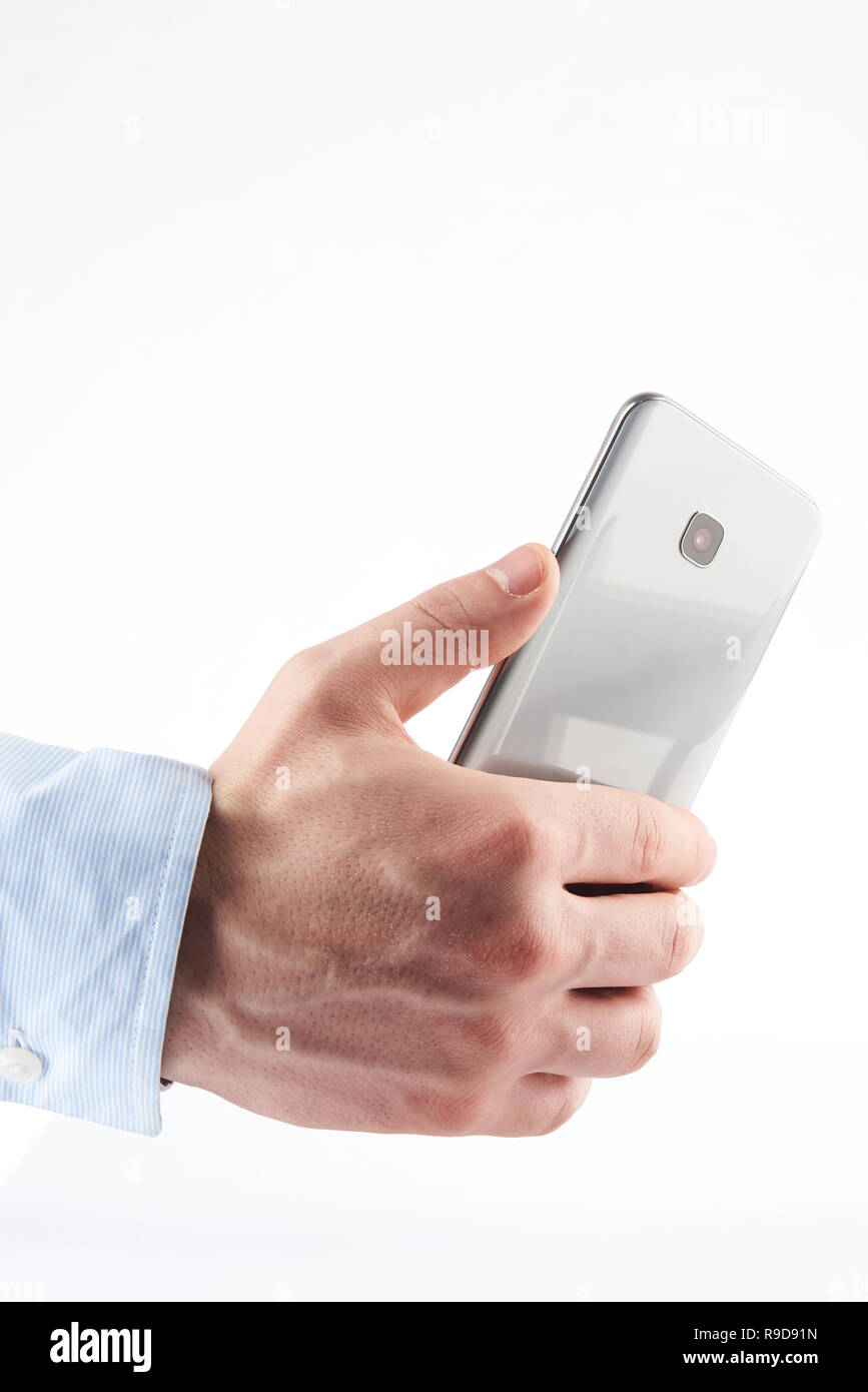 Using camera of smartphone in hand isolated on white background Stock ...