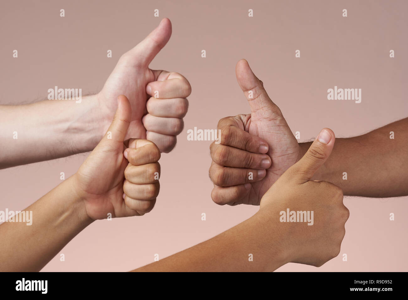 Many thumbs up. Hands doing gesture of good. Team concept Stock Photo ...