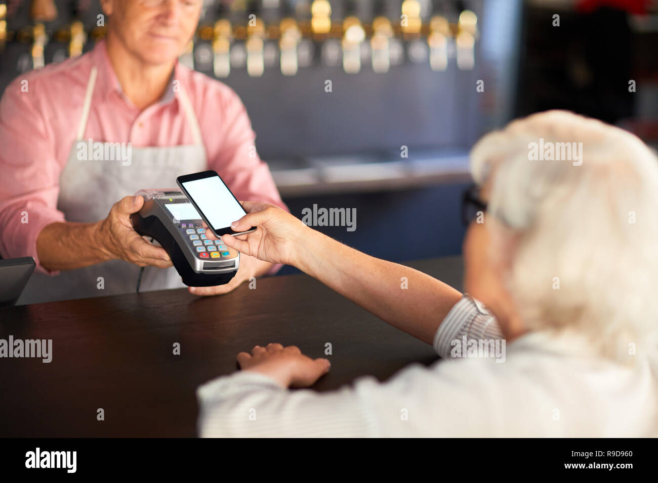 Paying for food Stock Photo - Alamy
