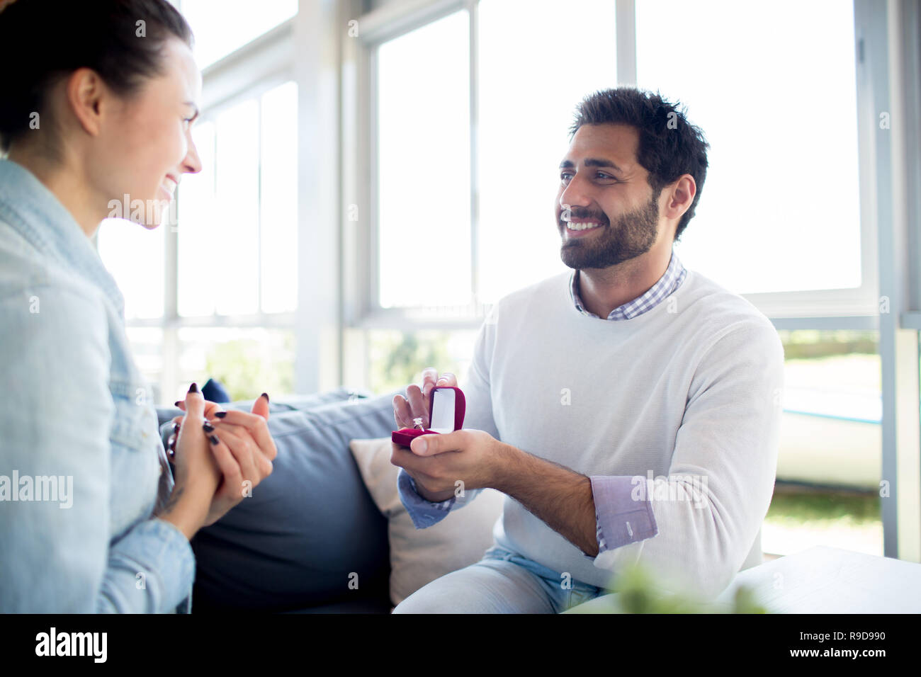 Giving engagement ring Stock Photo - Alamy