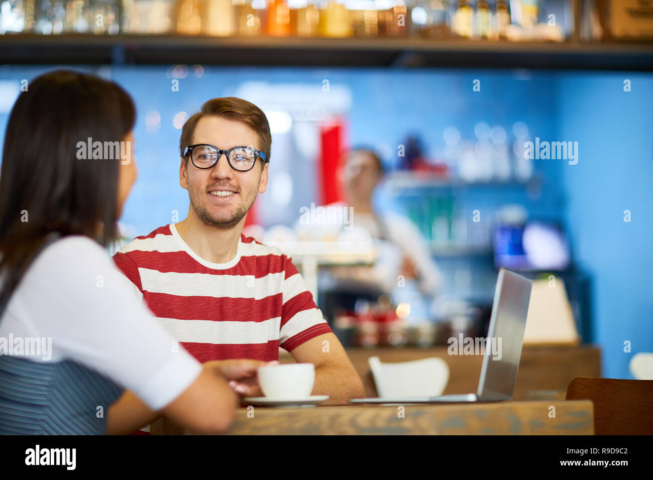 Talking at coffee break Stock Photo - Alamy
