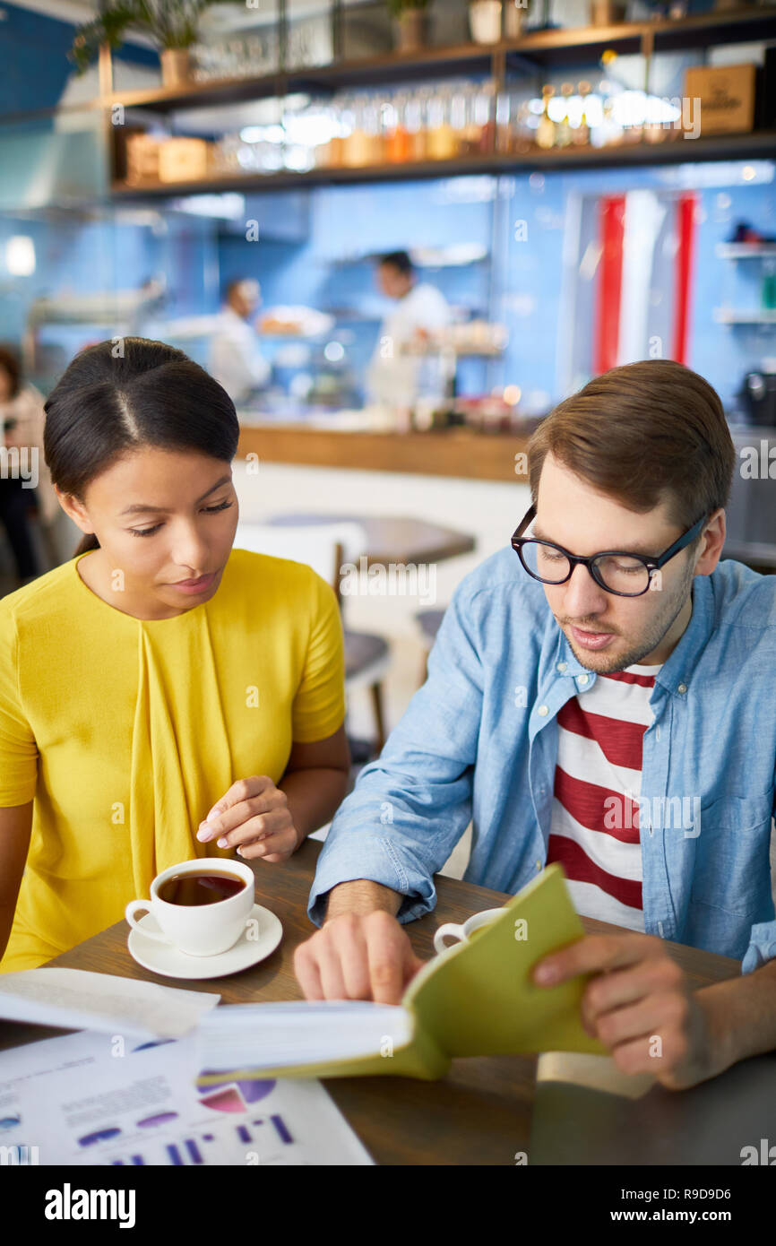 Group young economists discussing hi-res stock photography and images ...