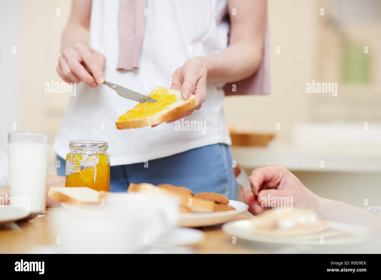 Making bread toast with jam Stock Photo - Alamy