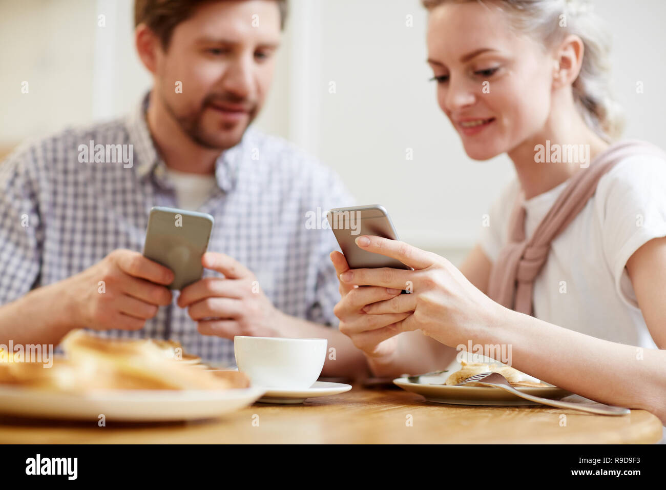 Showing photos on smartphones Stock Photo - Alamy