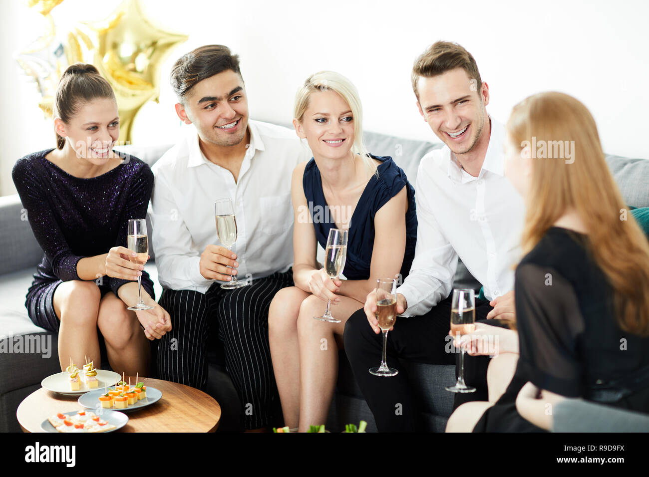 Laughing at party Stock Photo - Alamy
