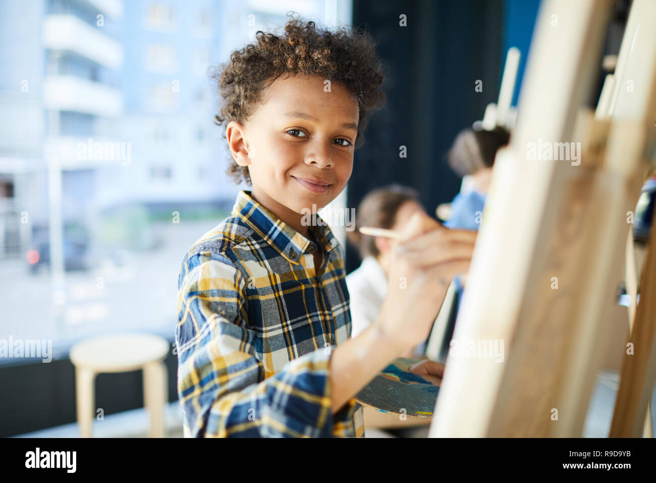 Boy in studio of arts Stock Photo - Alamy