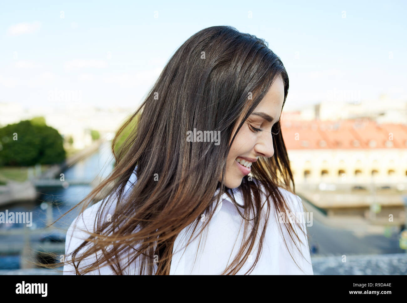 Happy beautiful girl enjoying wind Stock Photo - Alamy