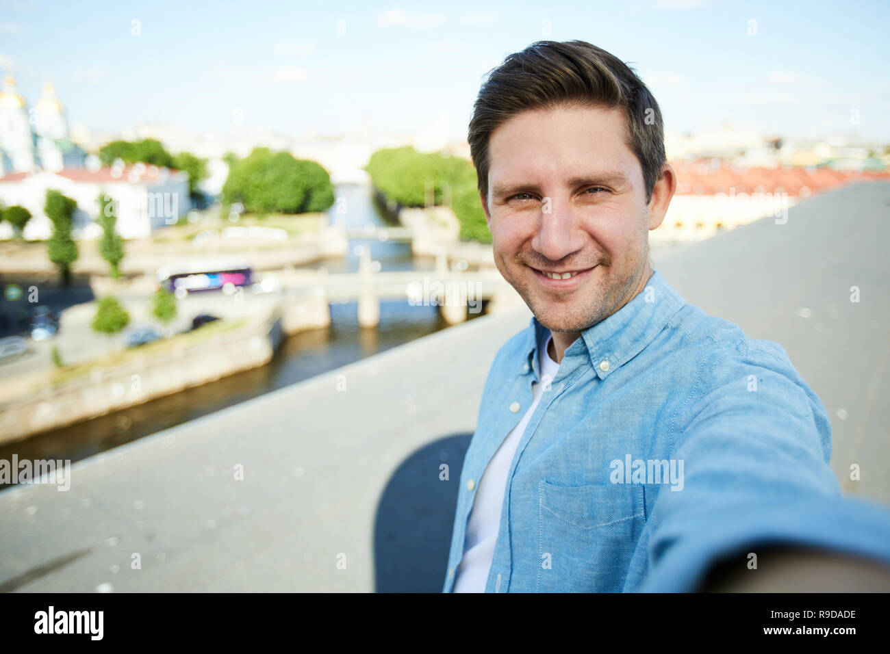 Self-portrait of man on roof Stock Photo - Alamy