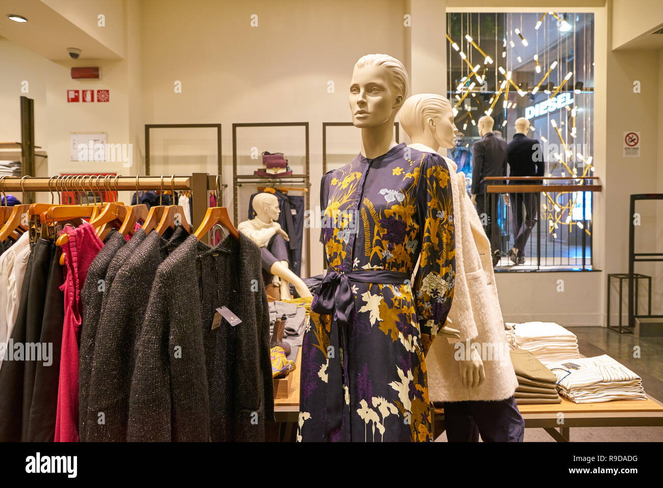 MILAN, ITALY - CIRCA NOVEMBER, 2017: clothing on display at retail ...