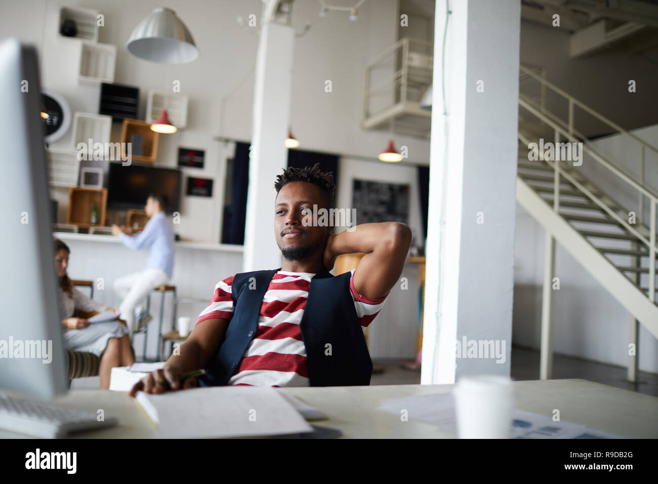 Relaxing in front of computer Stock Photo - Alamy