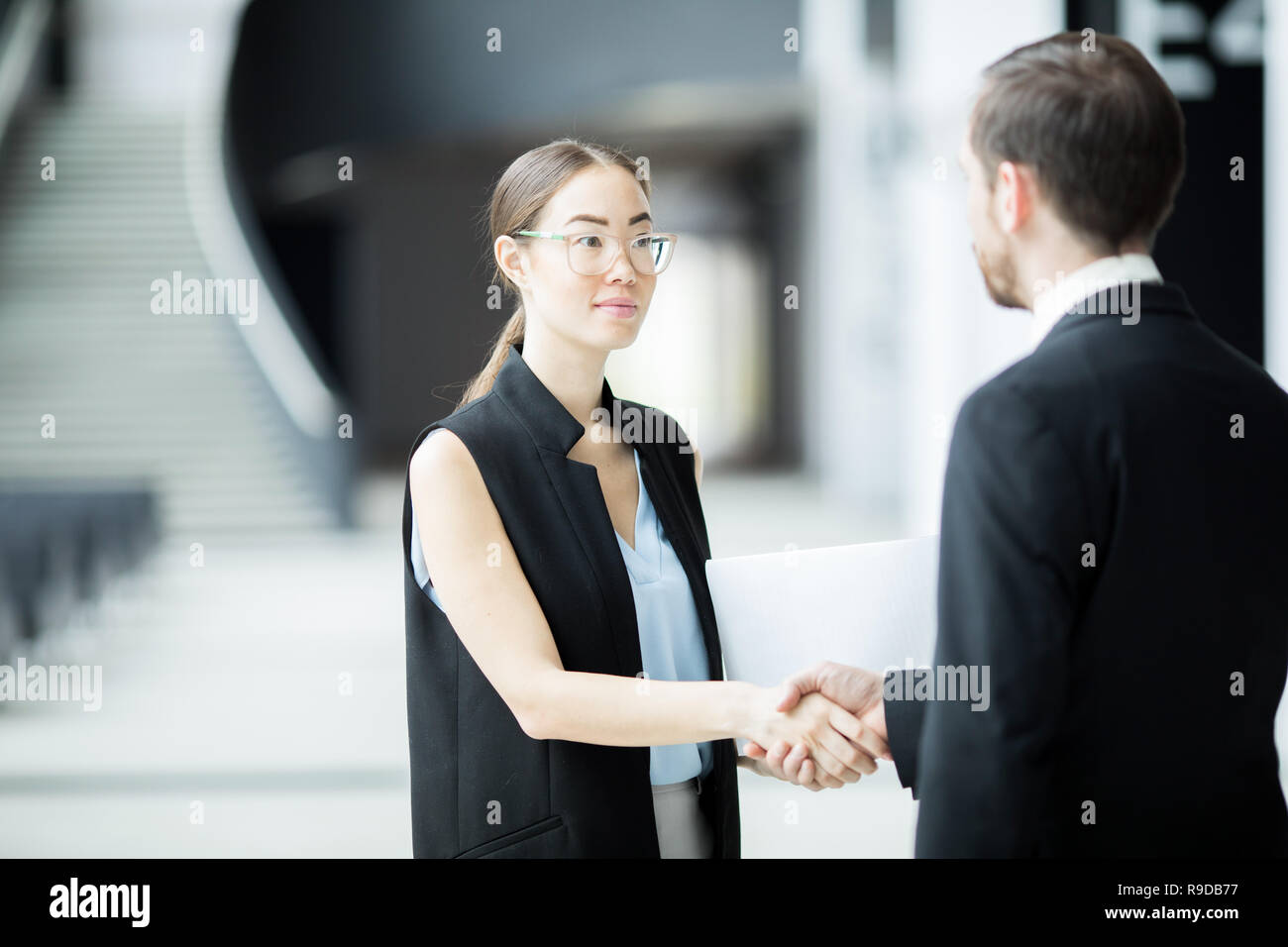 Greeting each other Stock Photo - Alamy
