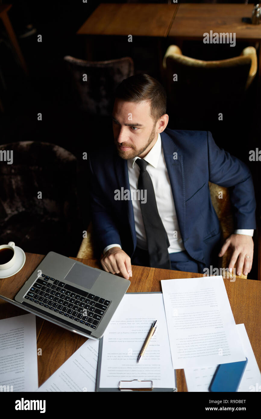 Content businessman making order in restaurant Stock Photo - Alamy