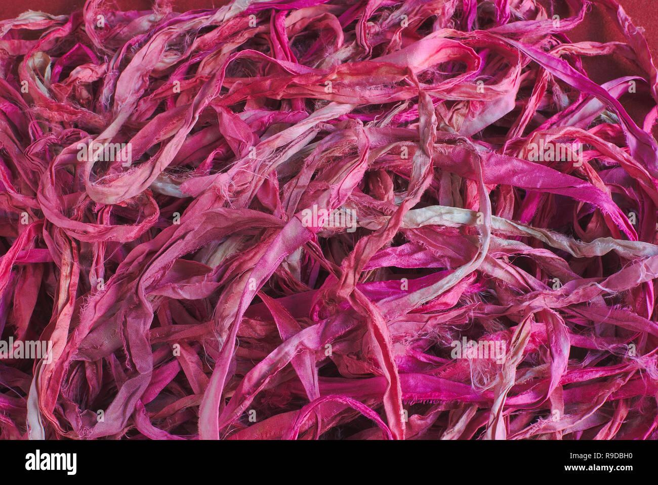 Pink silk ribbons background. Texture. Close-up shot, macro photography ...