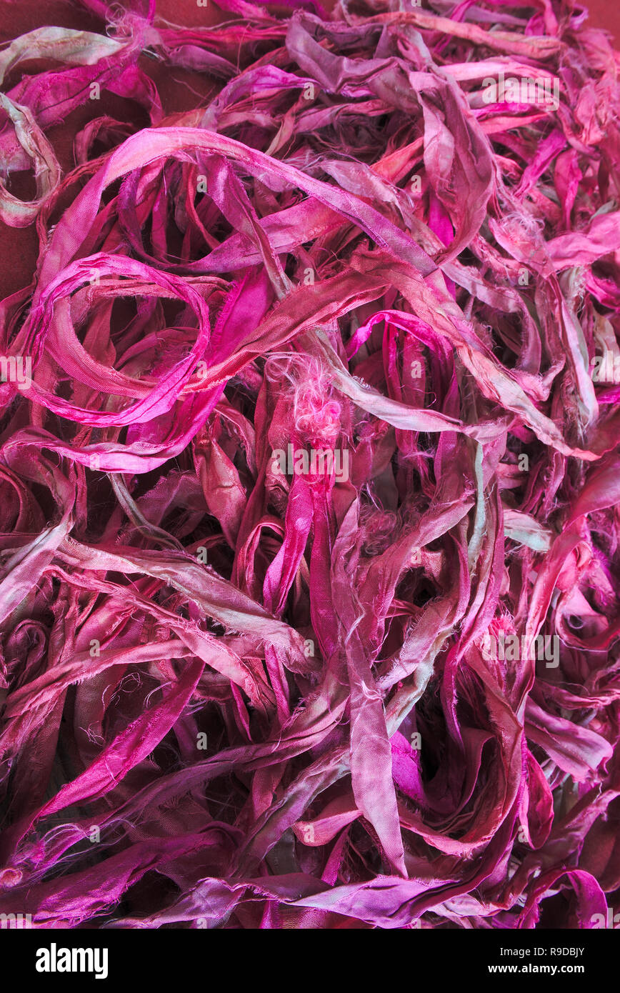 Pink silk ribbons background. Texture. Close-up shot, macro photography ...