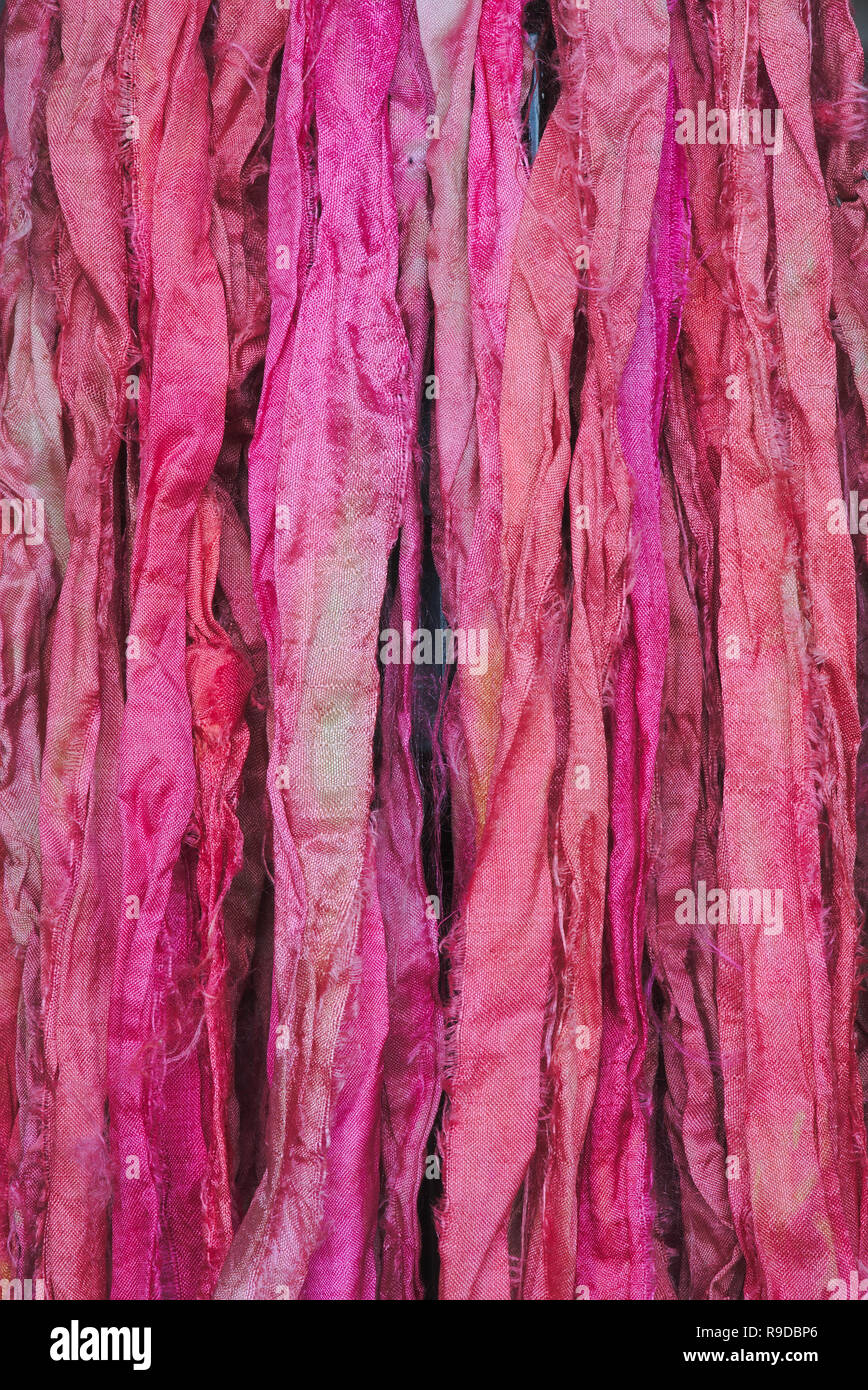 Pink silk ribbons background. Texture. Close-up shot, macro photography ...