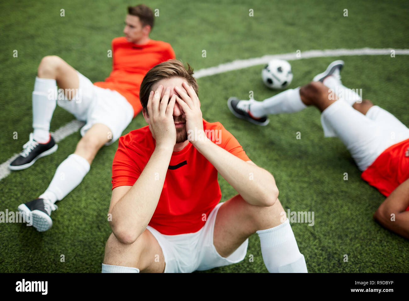Exhausted football player hi-res stock photography and images - Alamy