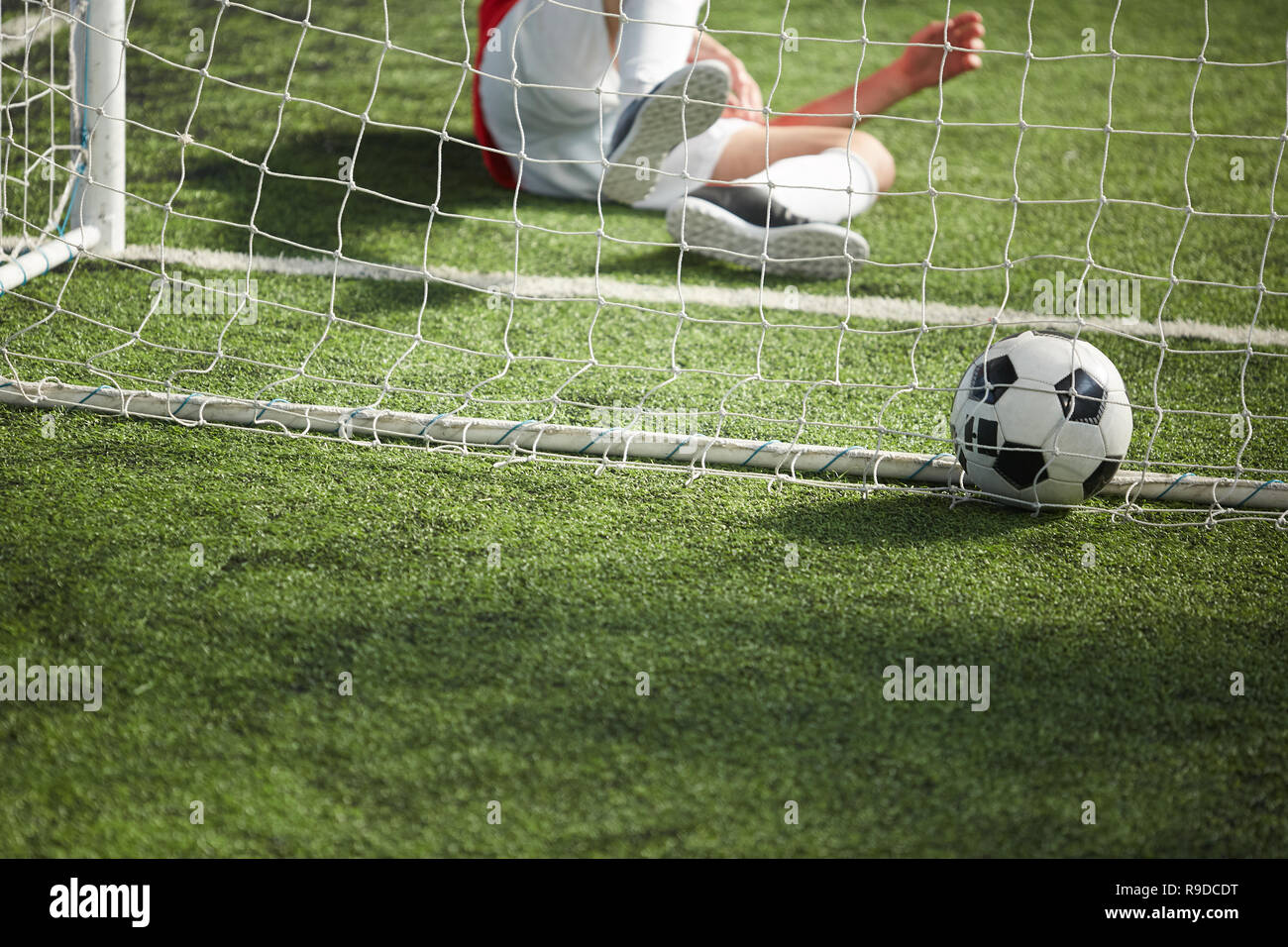Ball in gate Stock Photo - Alamy