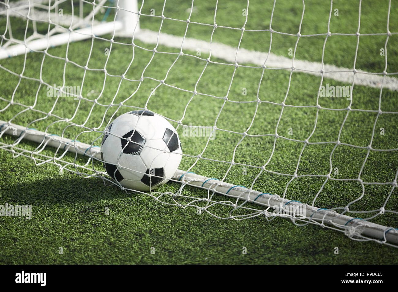 Soccer ball in gate Stock Photo - Alamy