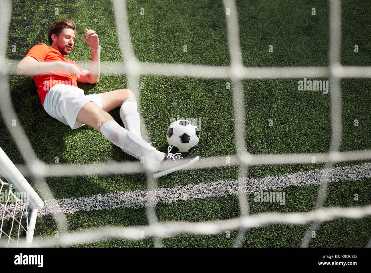 Falling soccer ball hi-res stock photography and images - Alamy