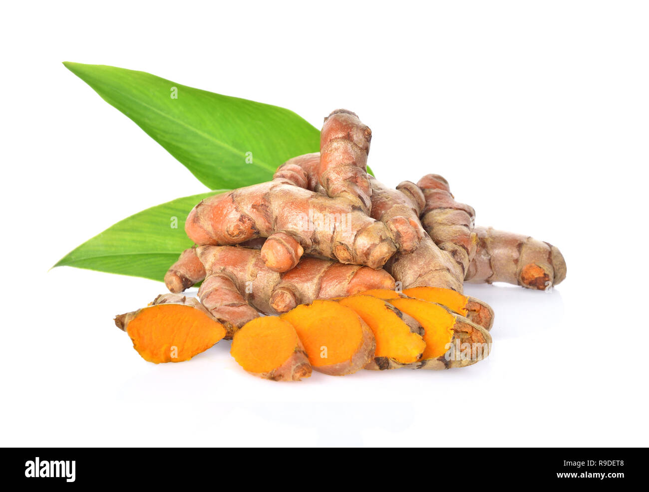 turmeric isolated on white background Stock Photo - Alamy