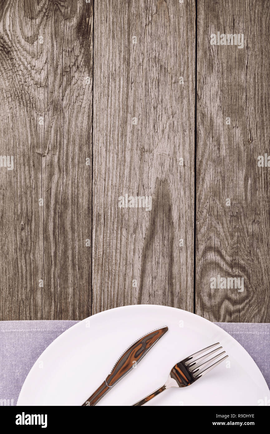 Empty dining table with cutlery and space for text. Food background ...