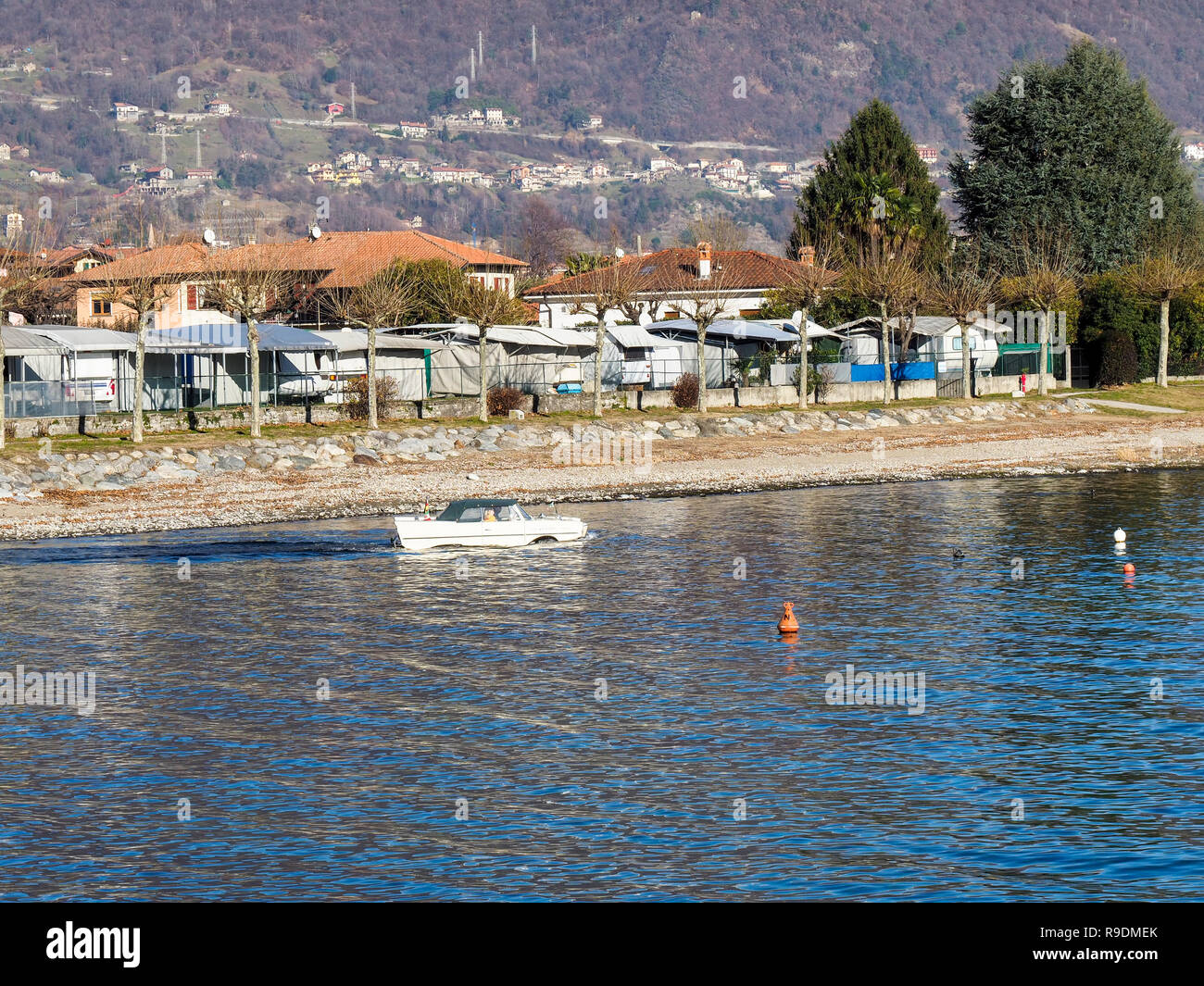 Dongo, Italy - December 22, 2018: Amphibious vehicle in navigation at ...
