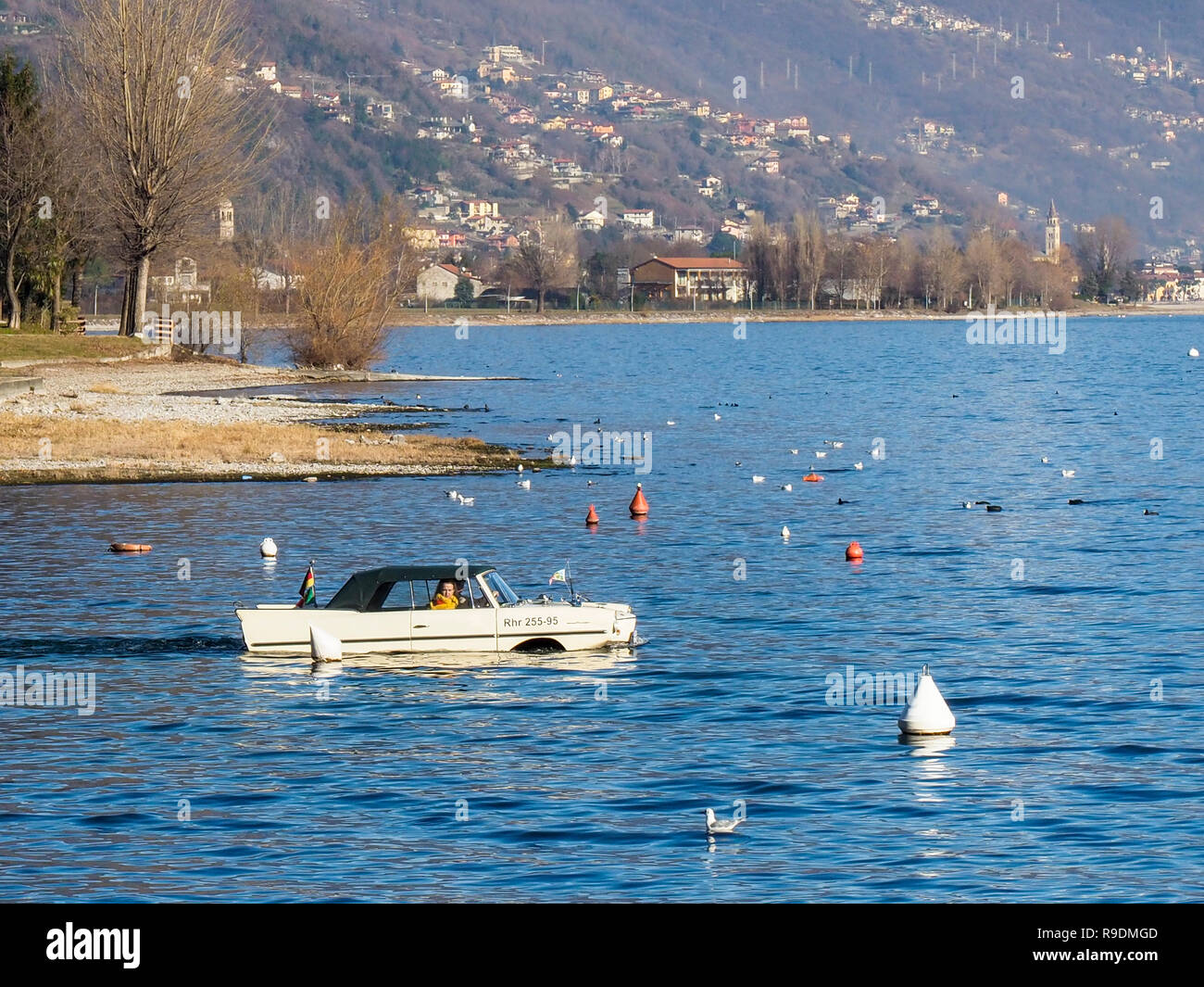 Dongo, Italy - December 22, 2018: Amphibious vehicle in navigation at ...