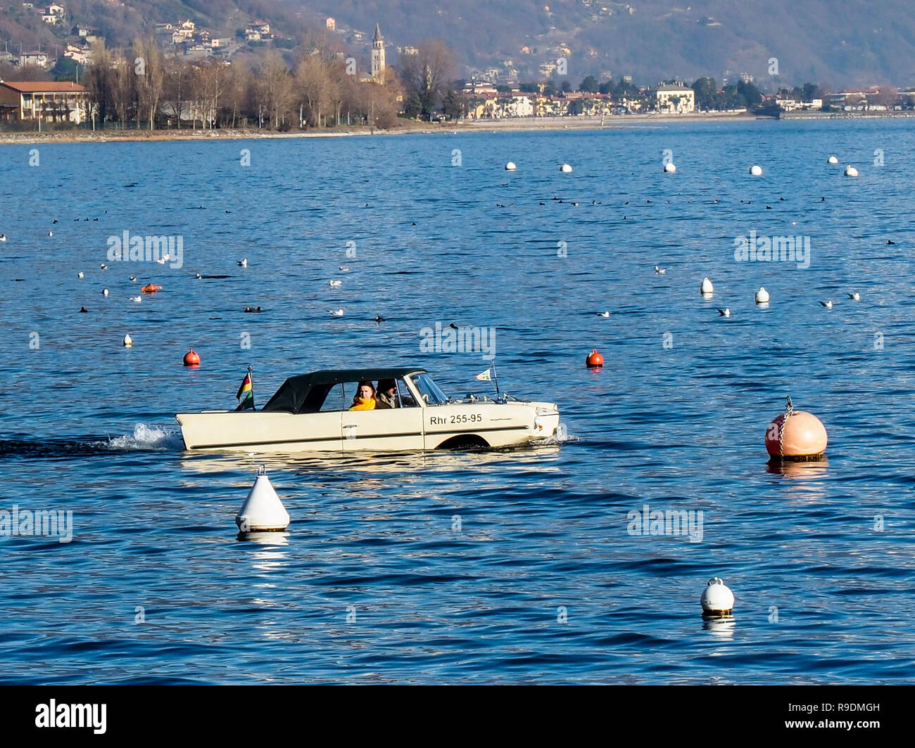 Dongo, Italy - December 22, 2018: Amphibious vehicle in navigation at ...