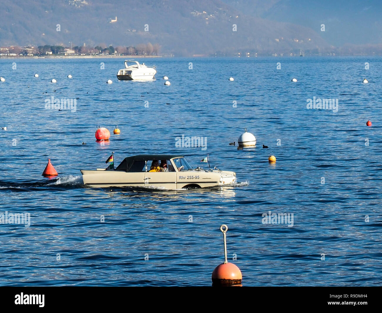 Dongo, Italy - December 22, 2018: Amphibious vehicle in navigation at ...