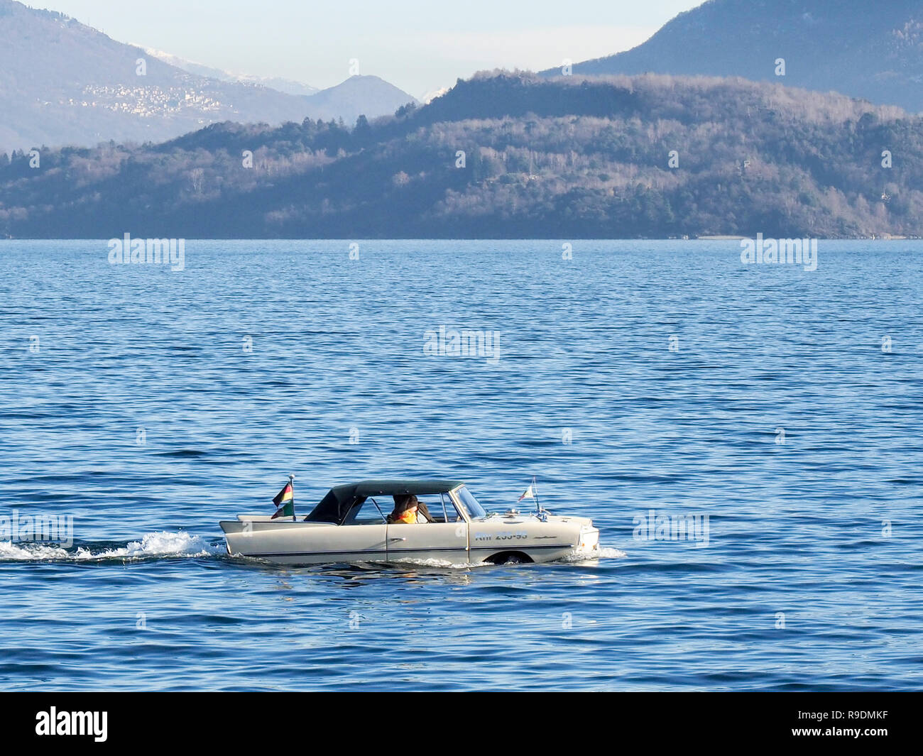 Dongo, Italy - December 22, 2018: Amphibious vehicle in navigation at ...