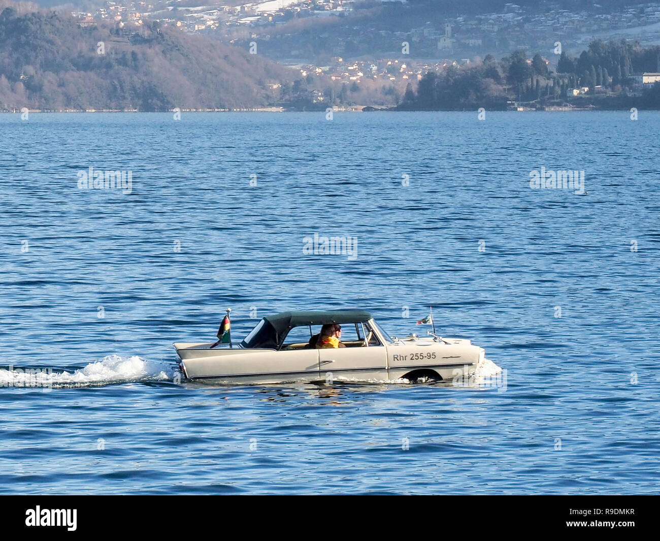 Dongo, Italy - December 22, 2018: Amphibious vehicle in navigation at ...