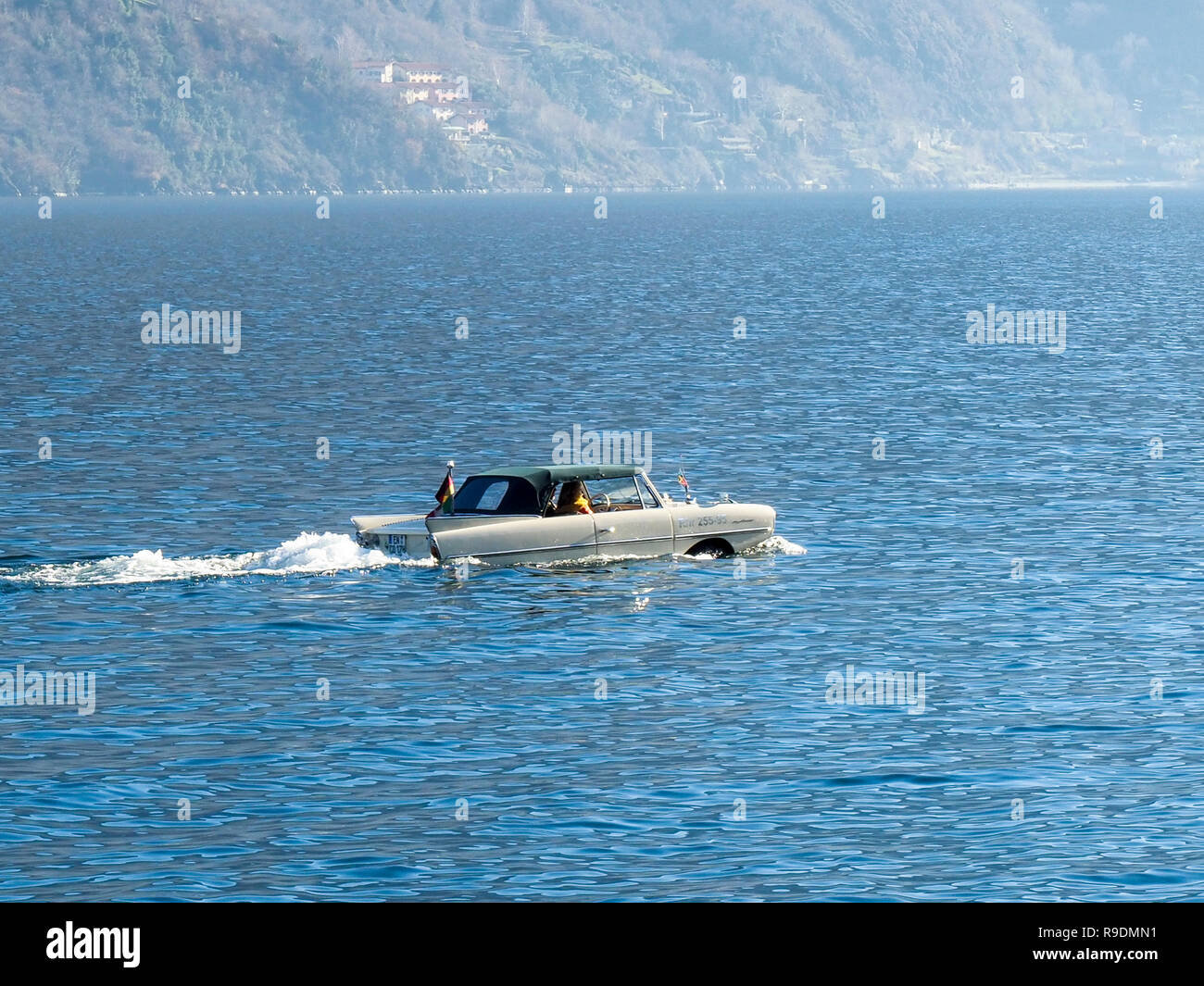Dongo, Italy - December 22, 2018: Amphibious vehicle in navigation at ...