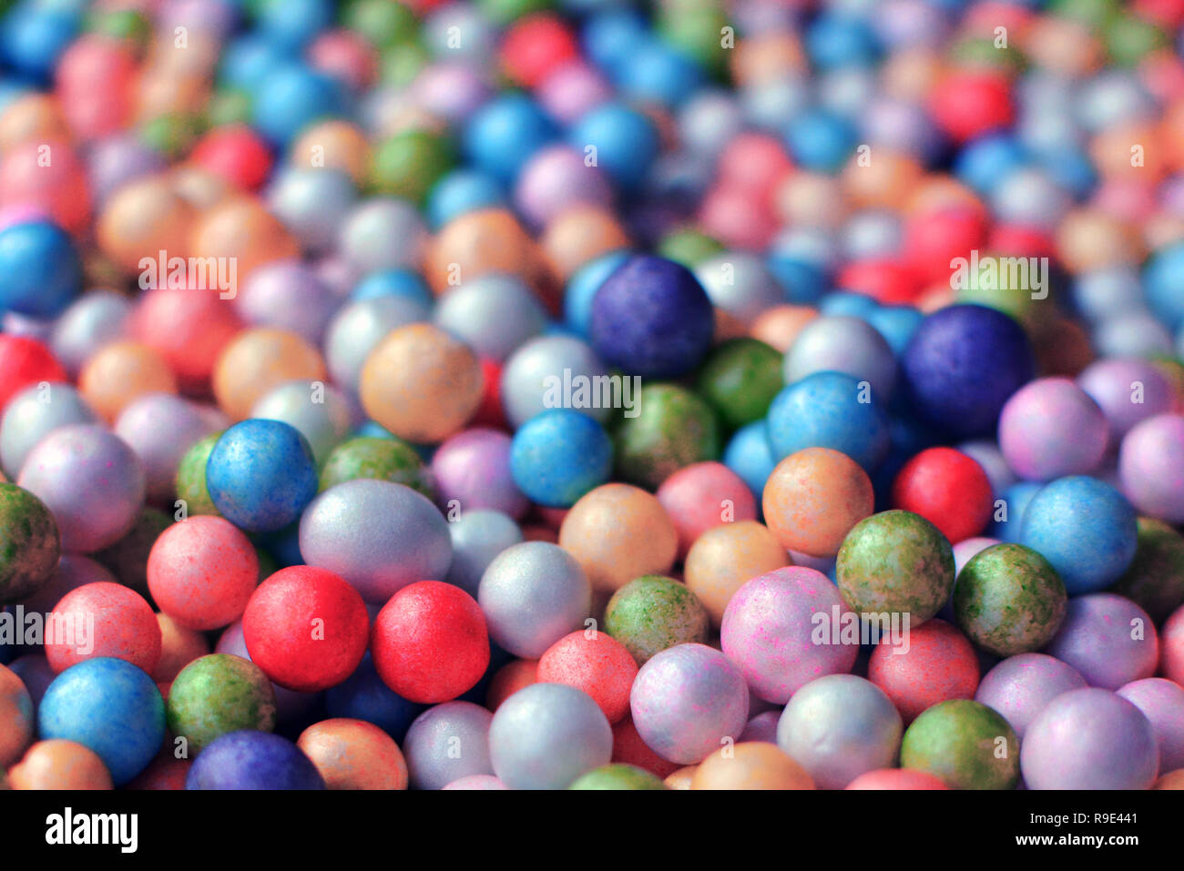 Close up multiple small of colorful foam balls suitable as background ...