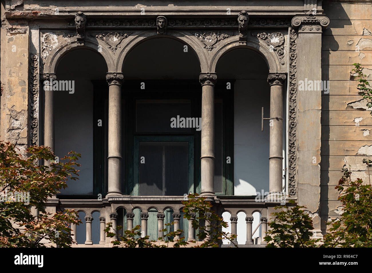 Balcony with decorative arches on an old European building Stock Photo ...