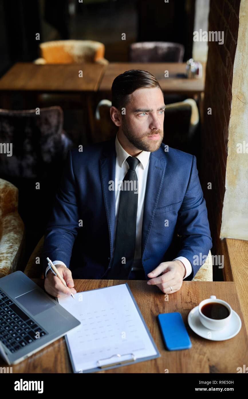 Man cafe thinking hi-res stock photography and images - Alamy