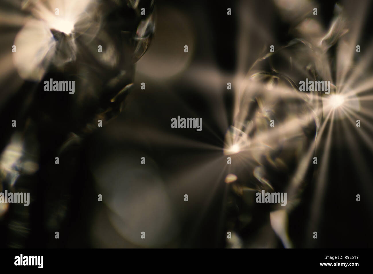 Waterdrops and light flares in the night Stock Photo - Alamy
