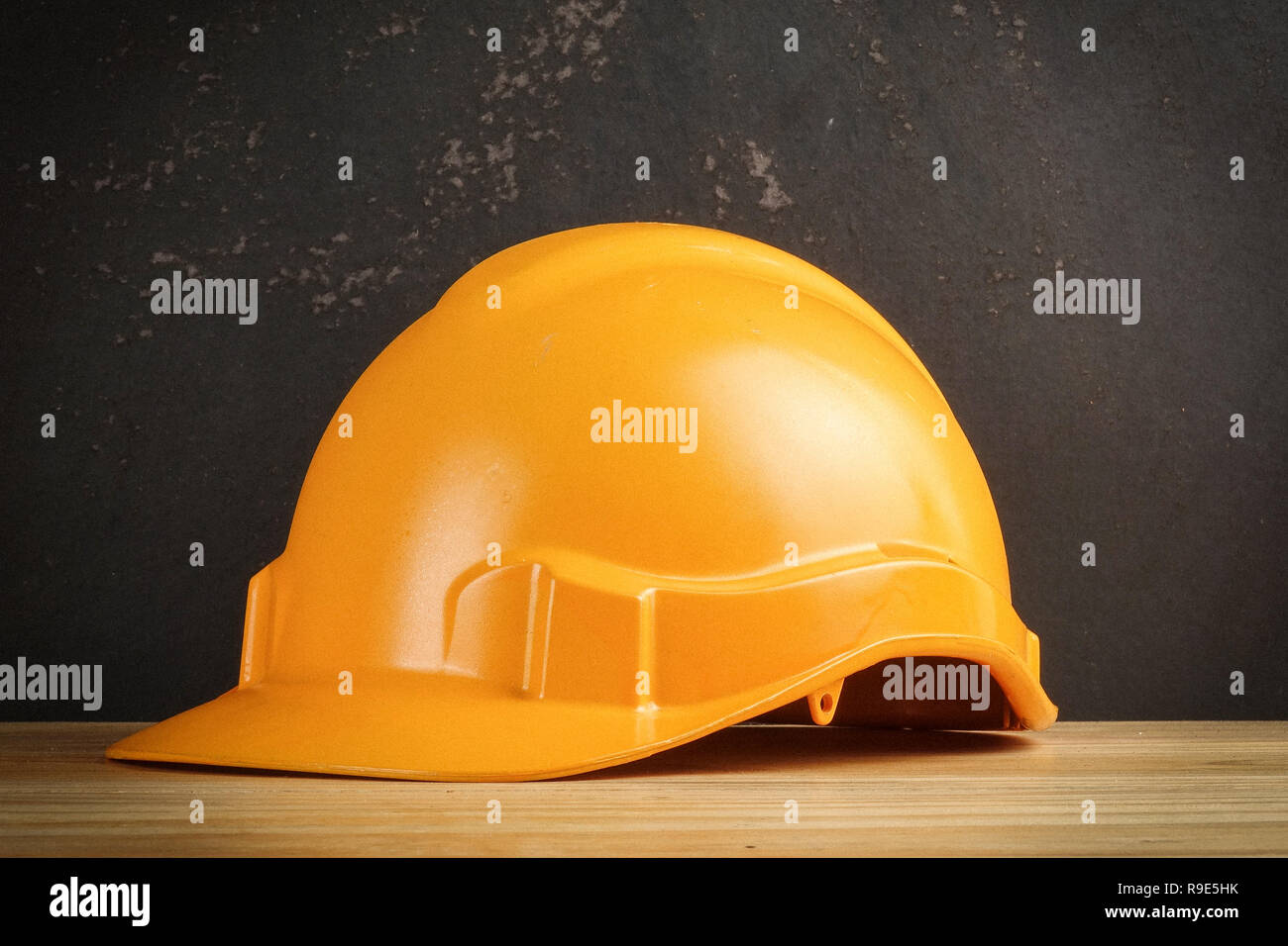Safety Personal Protective Equipment(PPE) on a rustic black background ...