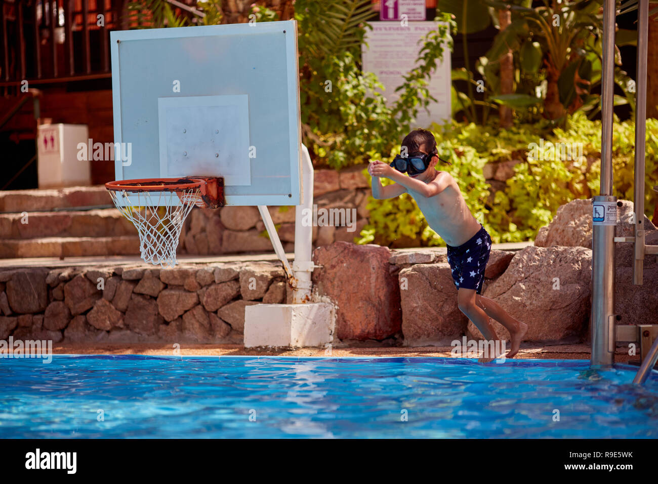 Teen jumping in water hi-res stock photography and images - Alamy