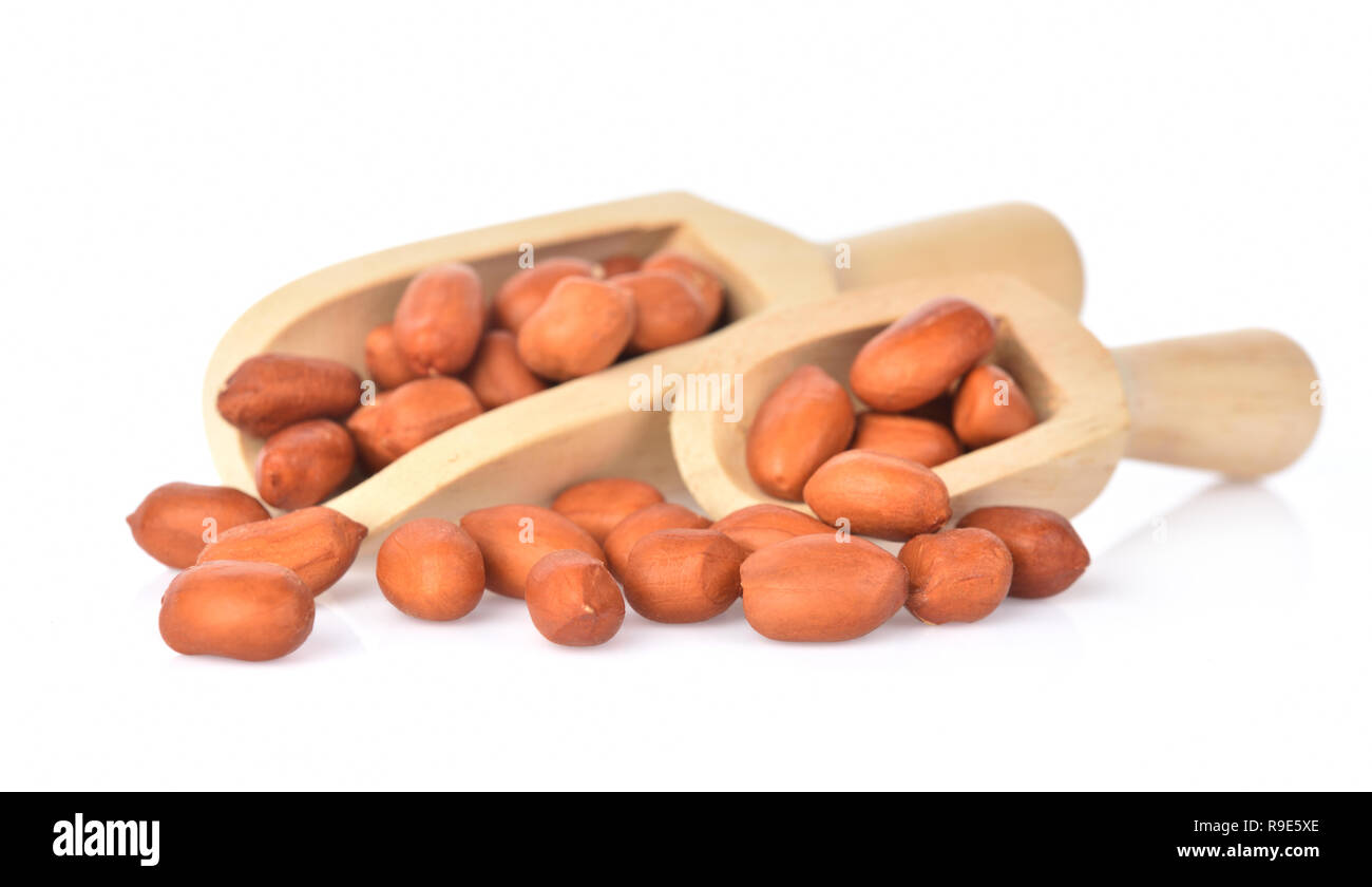 Peanut Wooden spoon on white background Stock Photo - Alamy