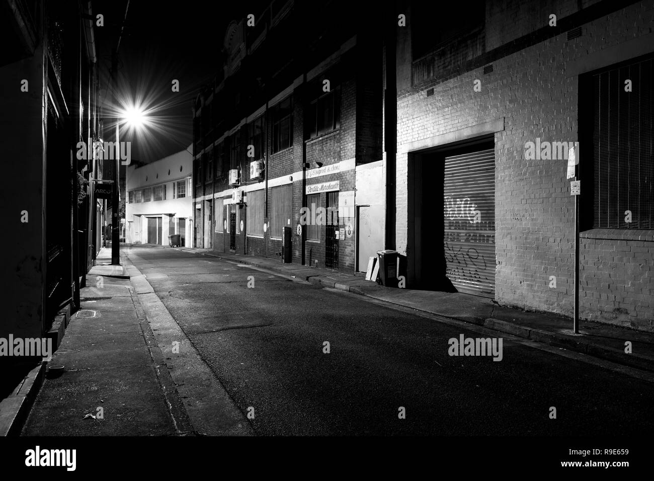 Person street city back night hi-res stock photography and images - Alamy