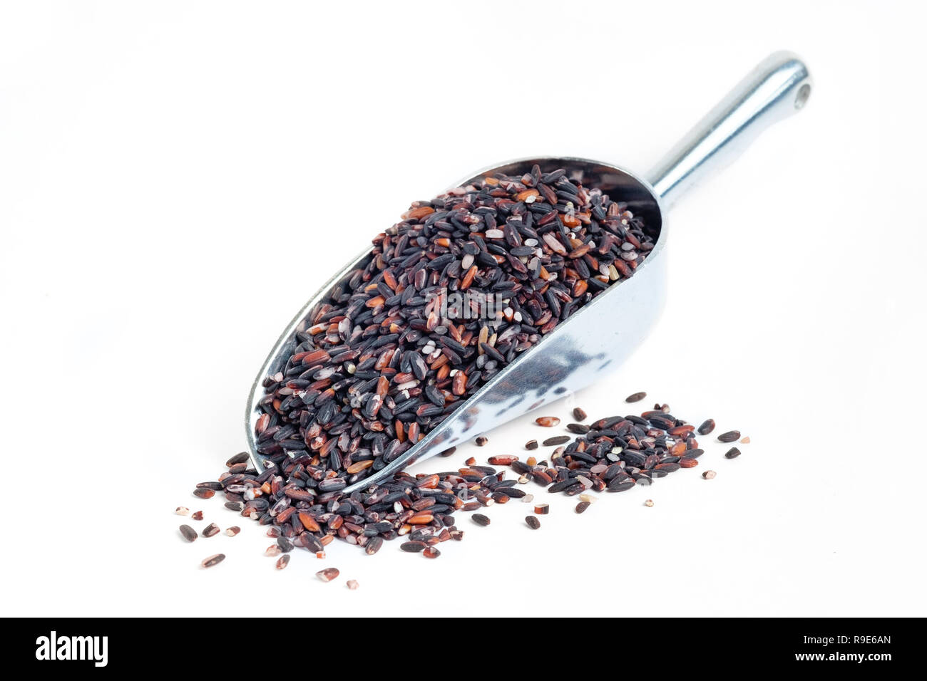 Black glutinous rice on white isolated background Stock Photo - Alamy