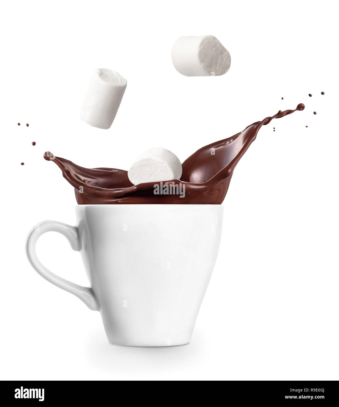 marshmallows falling into cup with hot chocolate or cocoa and creating ...